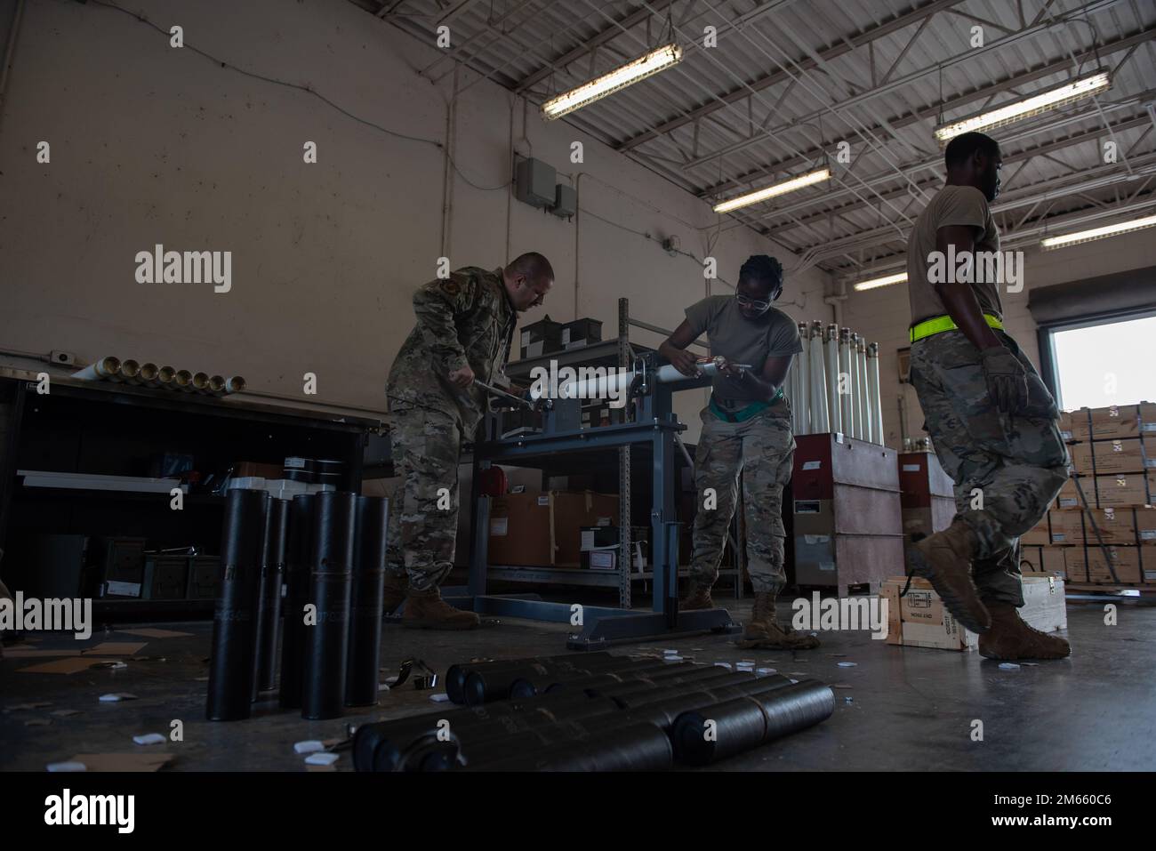 U.S. Air Force Airmen assigned to the 23rd Munitions Squadron assemble ...