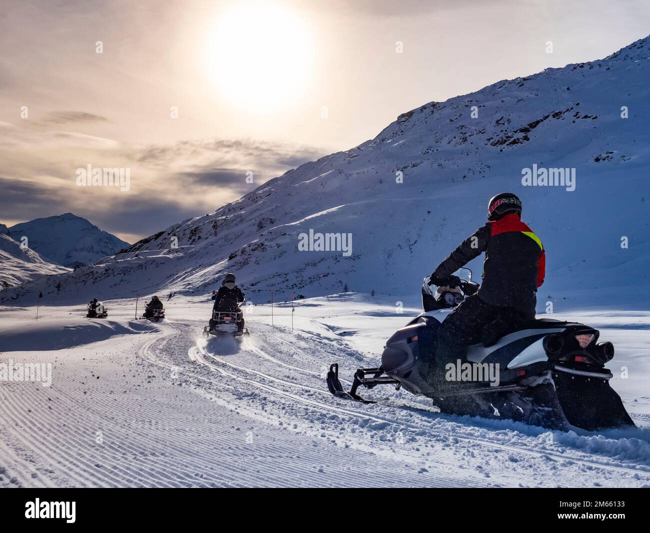 Snowmobiling alps hi-res stock photography and images - Alamy