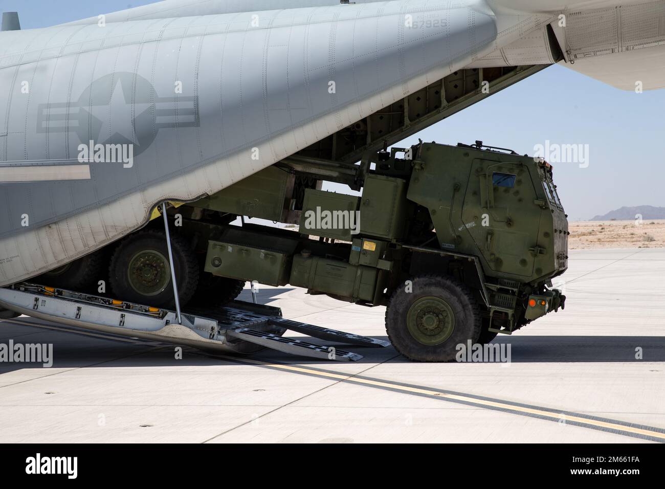 A U.S. Marine Corps M142 High Mobility Artillery Rocket System launcher ...