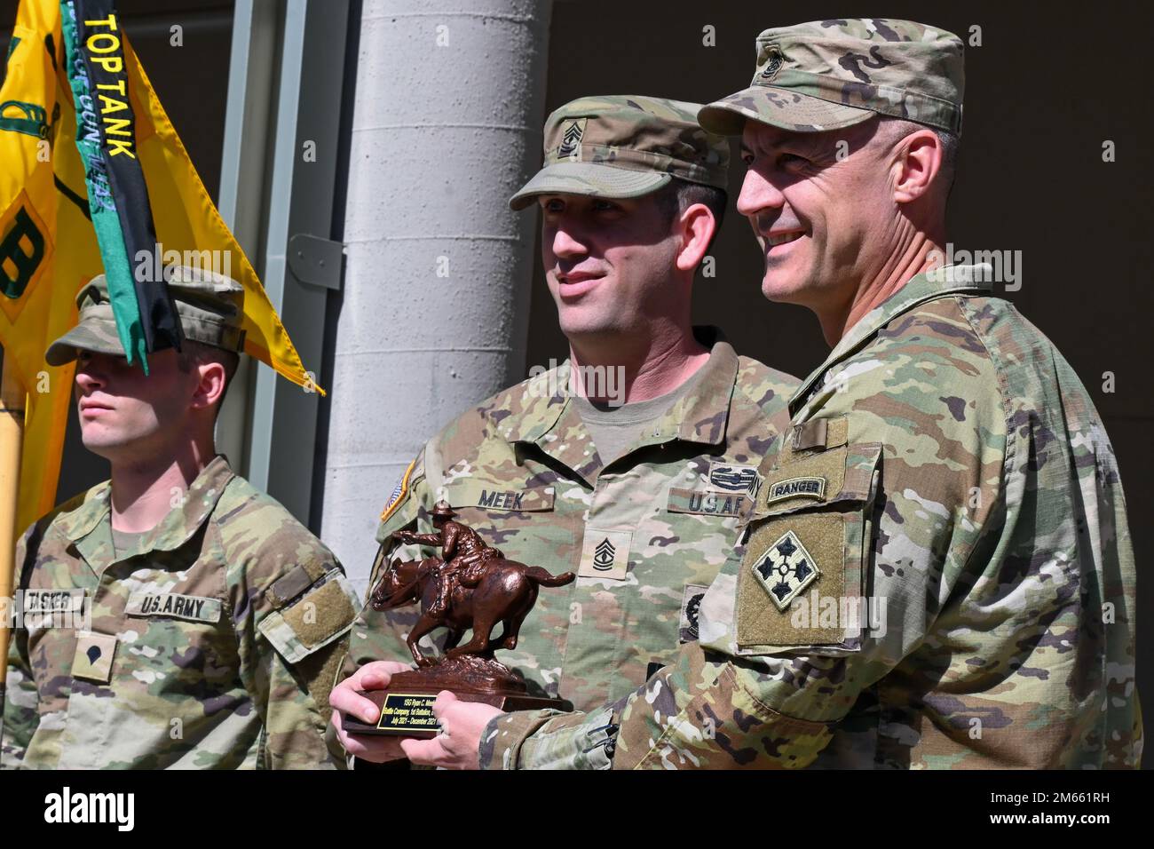 Capt. Marquis Morris, company commander, and 1st Sgt. Ryan Meek, with ...