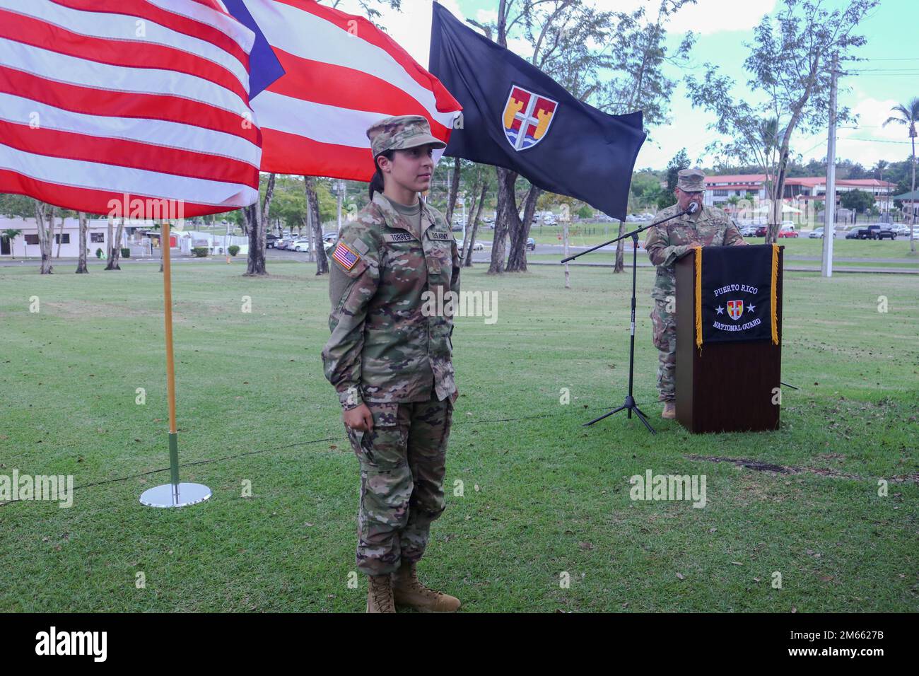 2nd Lt. Karla Torres attends to orders in the position of attention ...