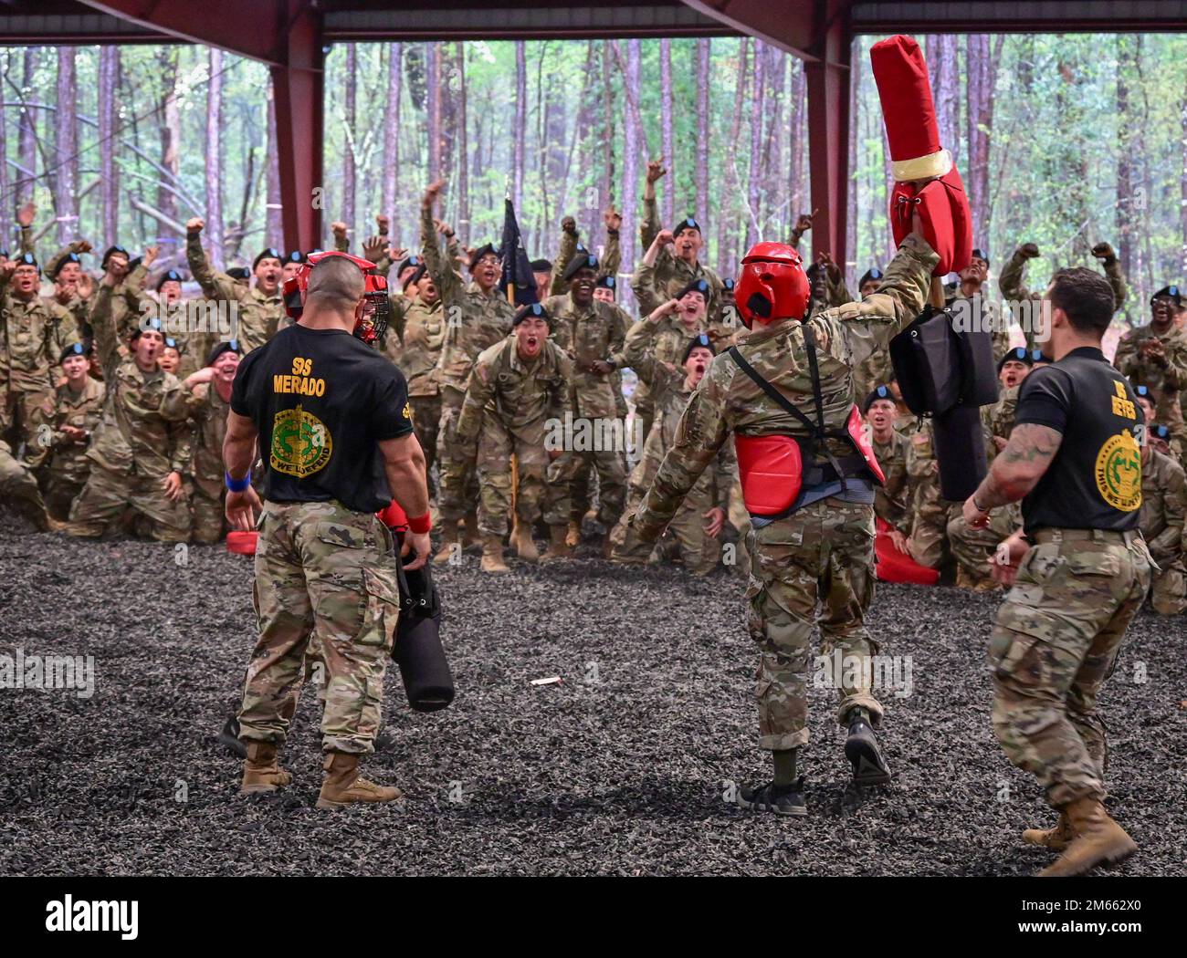 A trainee assigned to 1st Battalion, 61st Infantry Regiment raises his ...