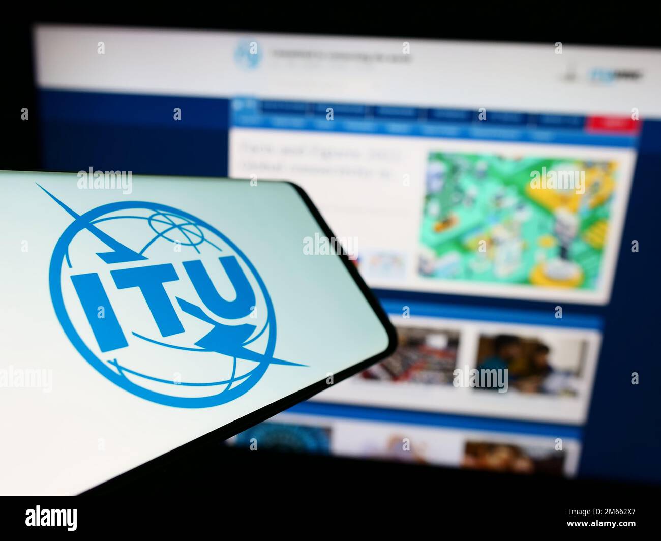 Mobile phone with logo of International Telecommunication Union (ITU ...