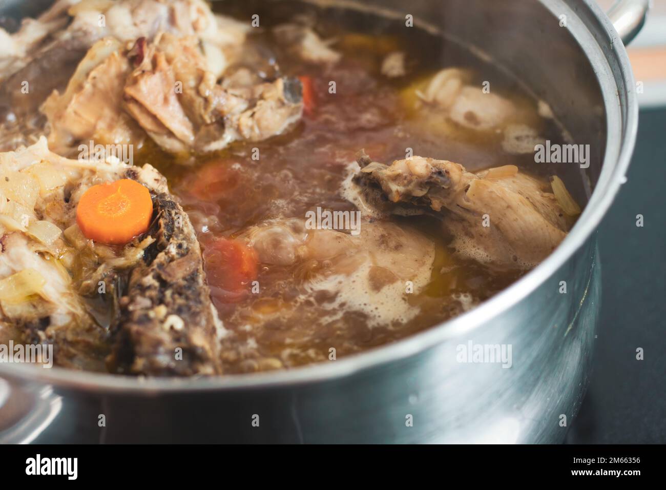 Shot boiling soup chicken hi-res stock photography and images - Alamy