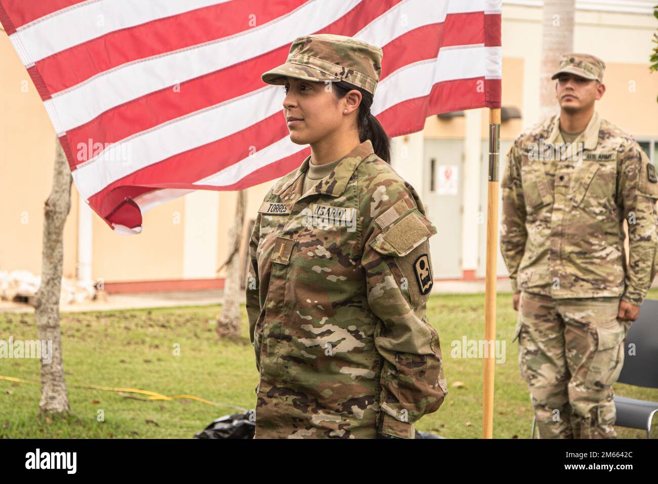 2nd Lt. Karla Torres attends to orders in the position of attention ...