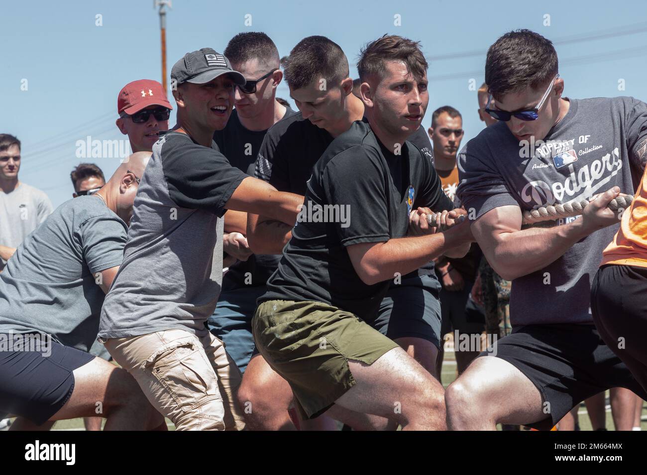 Instructors with Air Control Training Squadron, participate in a tug-of-war match during a unit ...