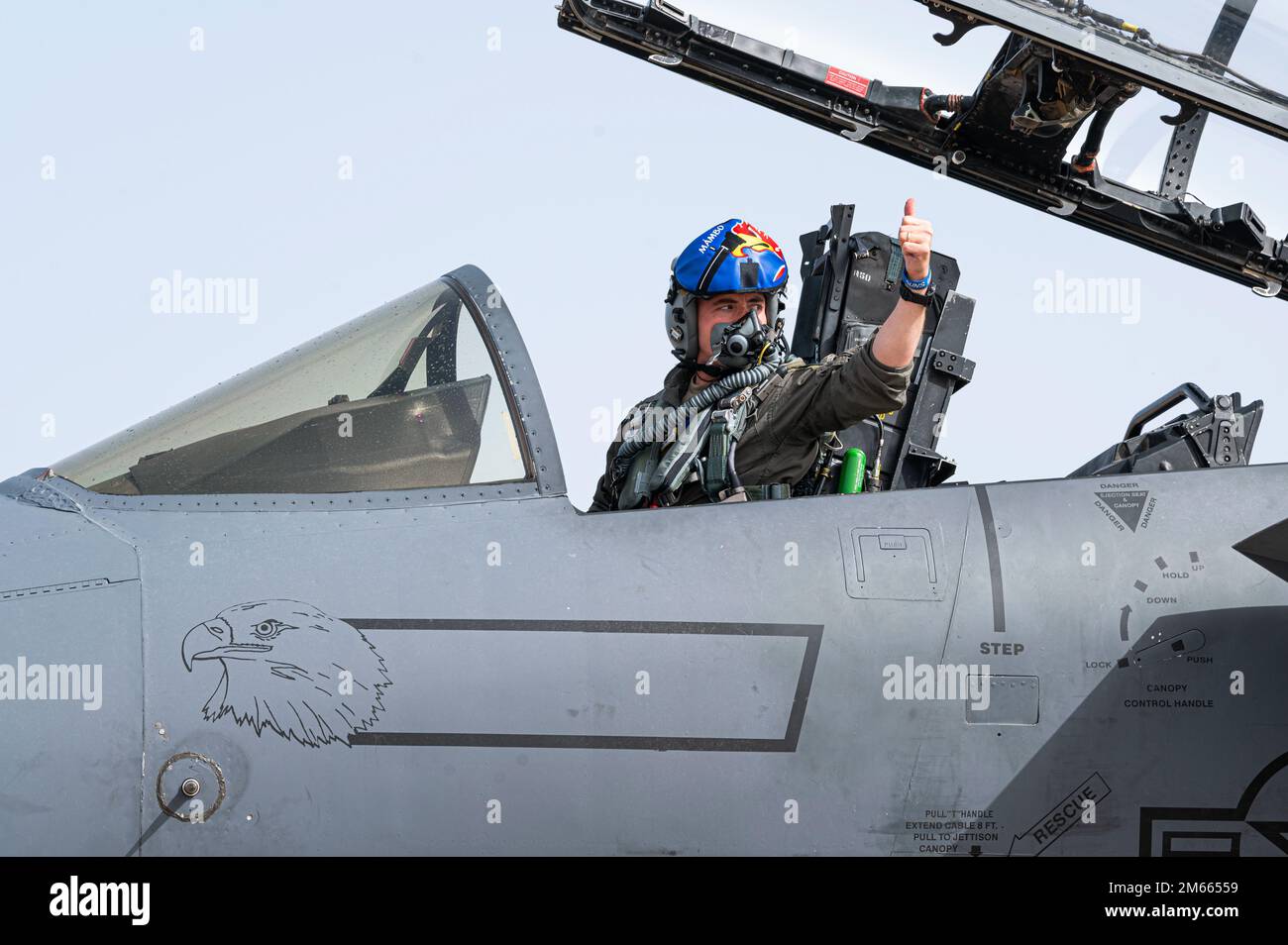 A U.S. Air Force F-15E Strike Eagle pilot gives a thumbs-up prior to take off April 6, 2022, at ...
