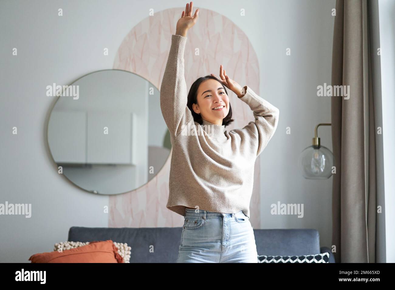 Women and wellbeing. Beautiful young asian woman dancing, feeling ...