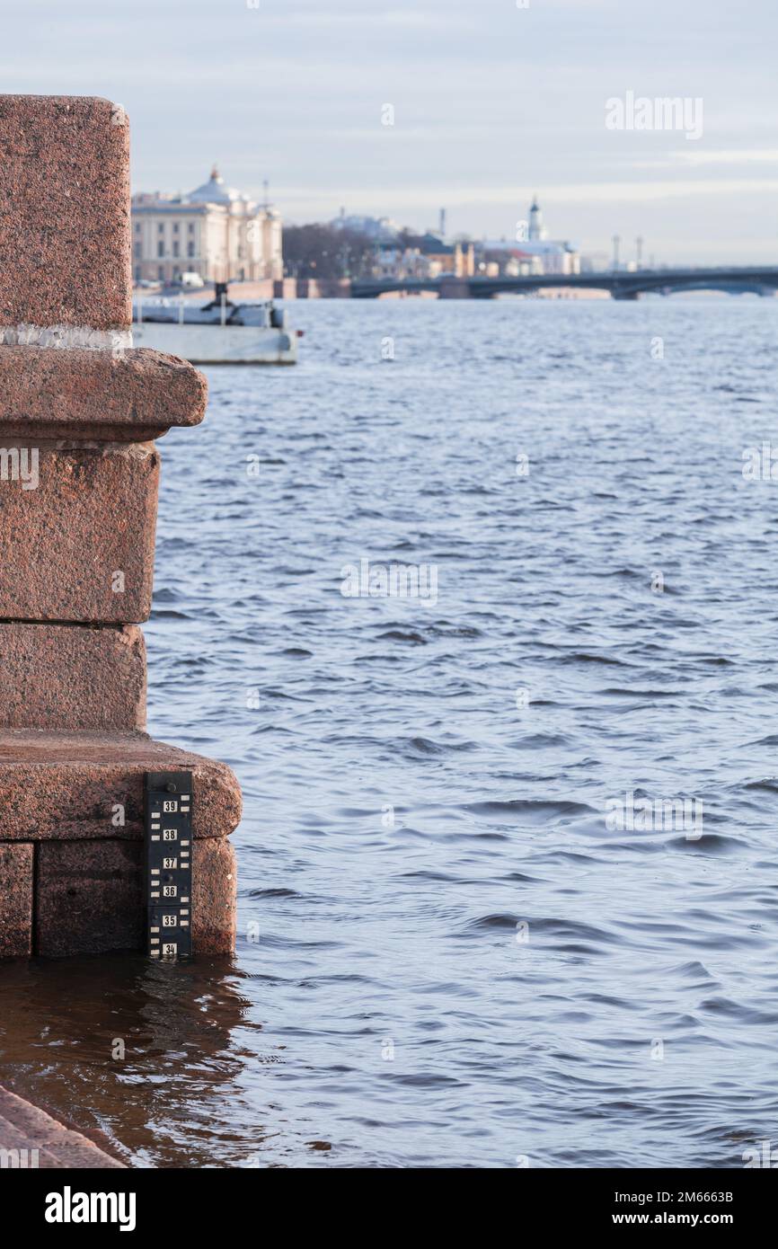 Tide gauge mounted at granite bank of Neva river, Saint-Petersburg ...