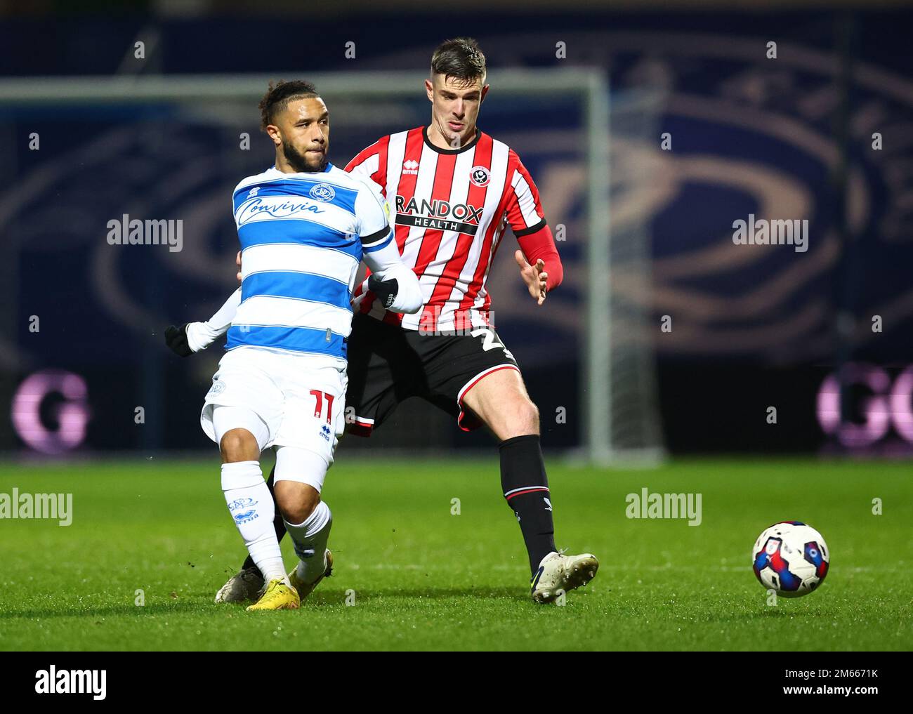 London, UK. 2nd Jan, 2023. Tyler Roberts of QPR closed down by Ciaran ...