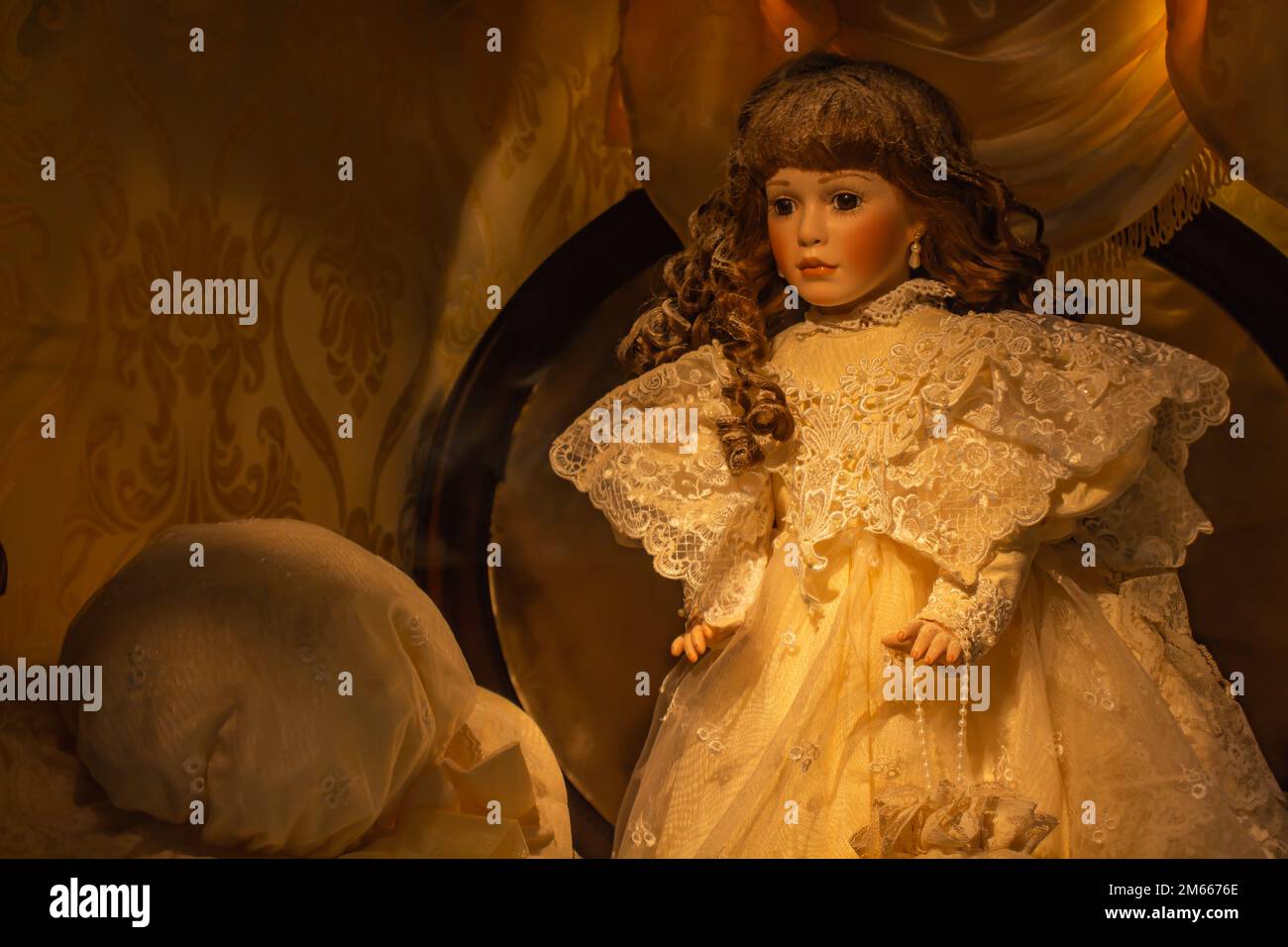 Beautiful dust covered porcelain doll in white lace Stock Photo - Alamy