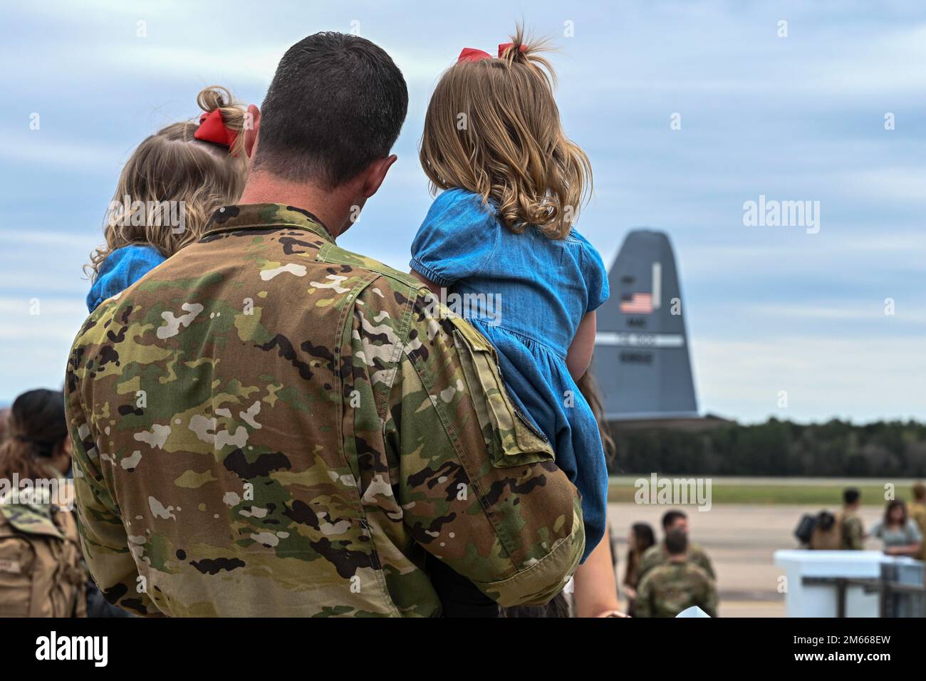 An Airman from the 61st Airlift Squadron reunites with his daughters at ...