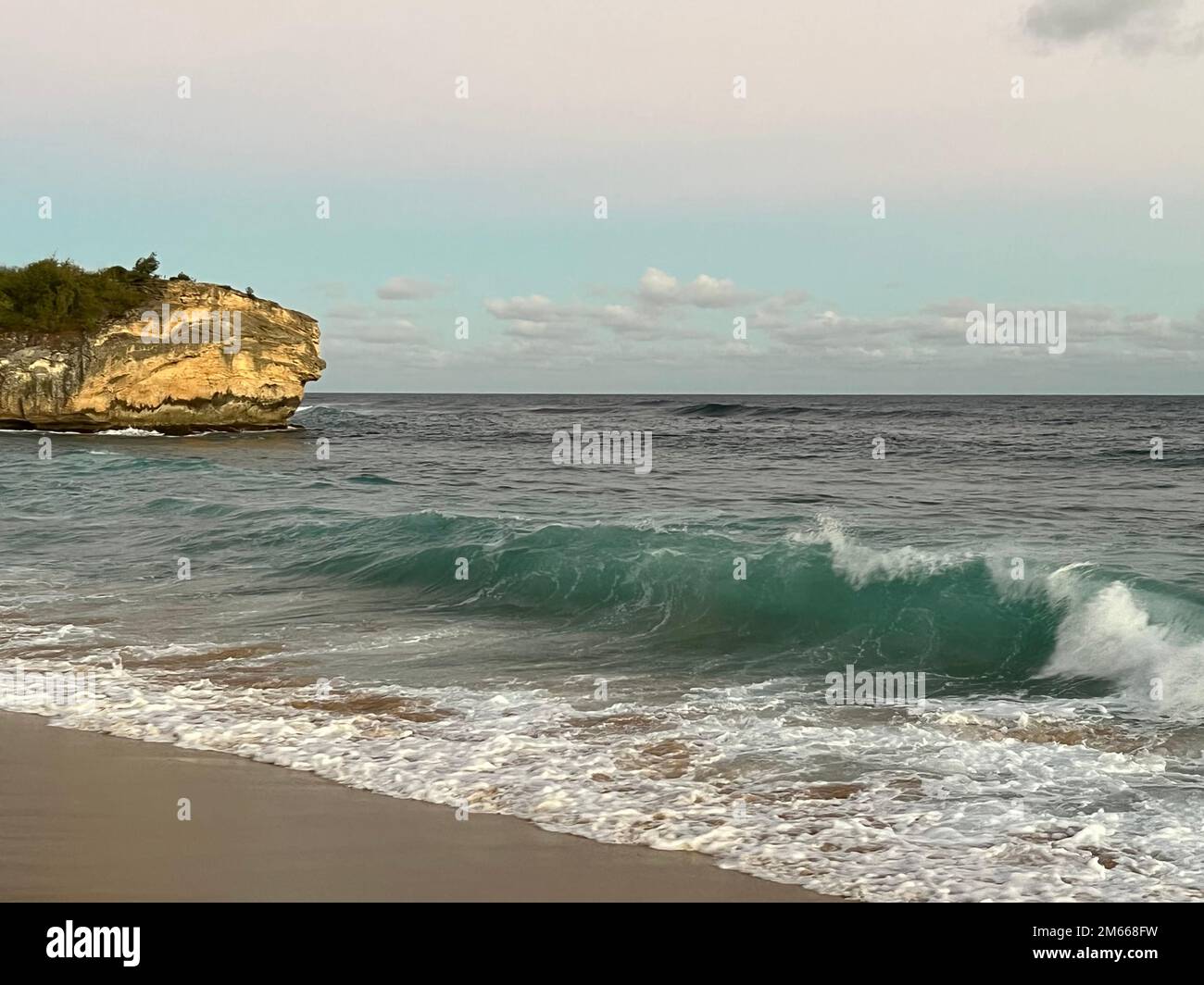 Waves at Shipwreck Beach on Kauai Stock Photo - Alamy