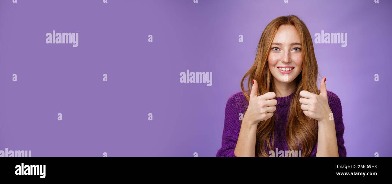 Impressed girl admiring great music taste of friend showing thumbs up ...