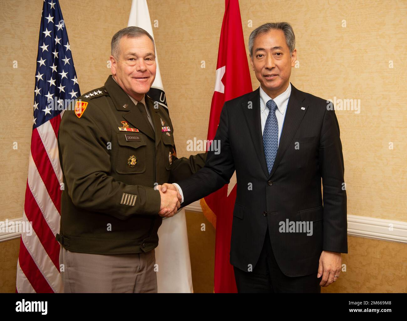 U.S. Army Gen. James Dickinson, U.S. Space Command commander (left ...