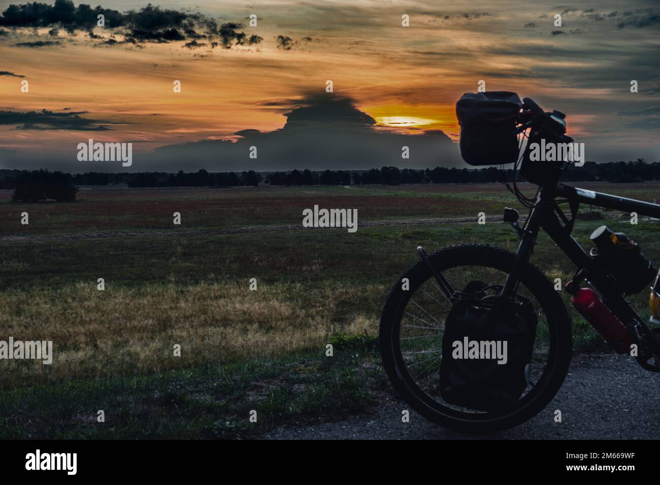 A bicycle at sunrise Stock Photo - Alamy