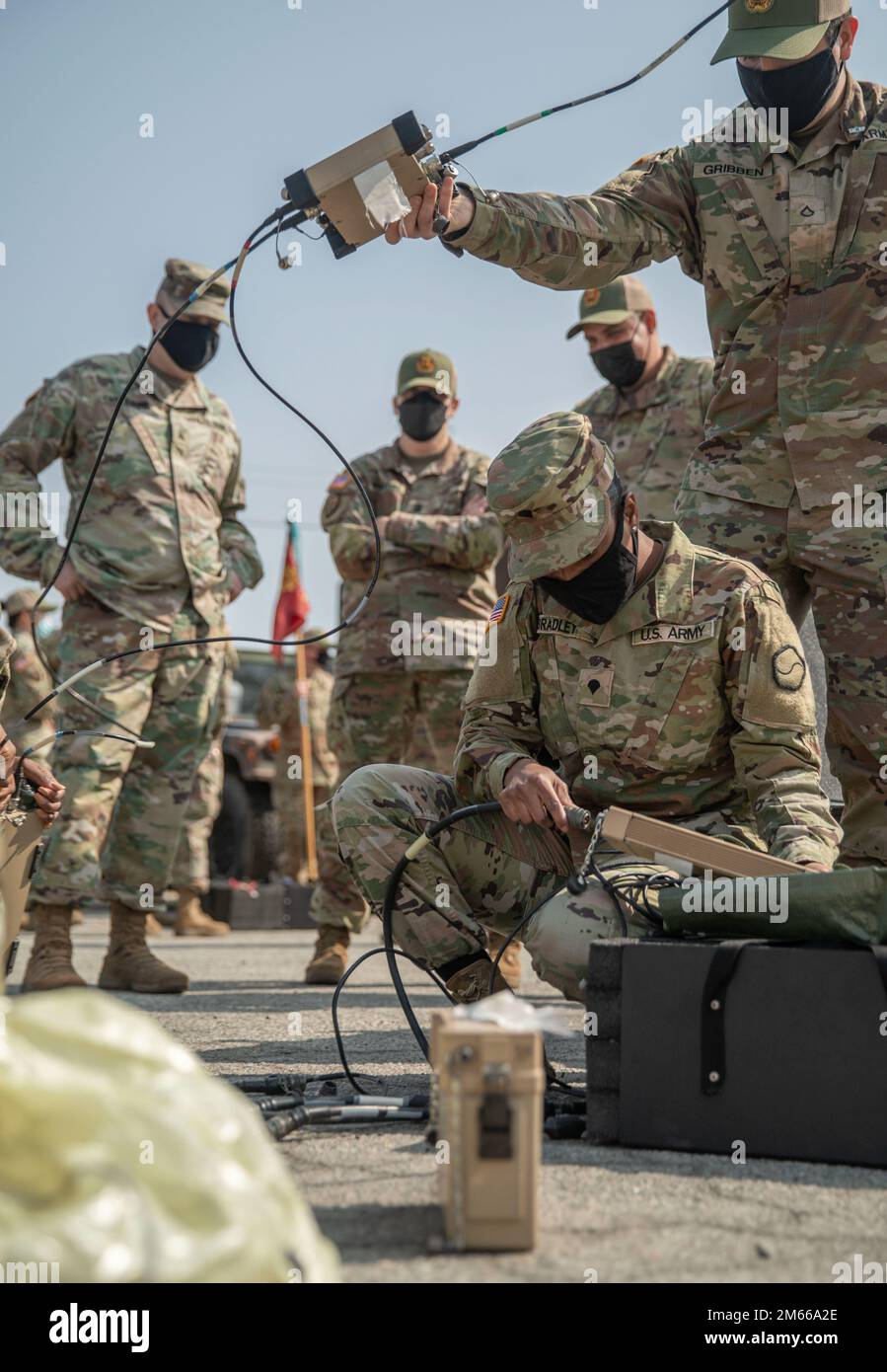 U.S. Army Soldiers assigned to 25th Transportation Battalion, set up an ...