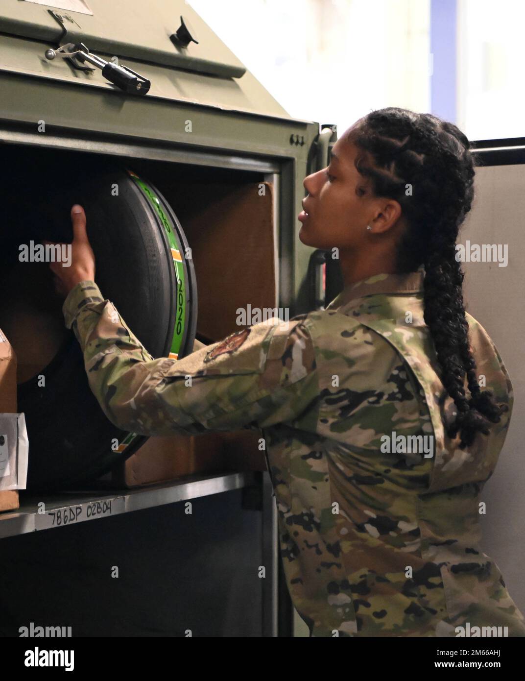 U.S. Air Force Airman Hastings, Aircraft Technician, 509 LRS, checks ...