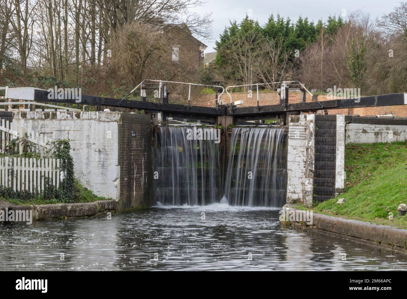 Water flowing over the lock gates of Hanwell Flight (No 95) on the ...