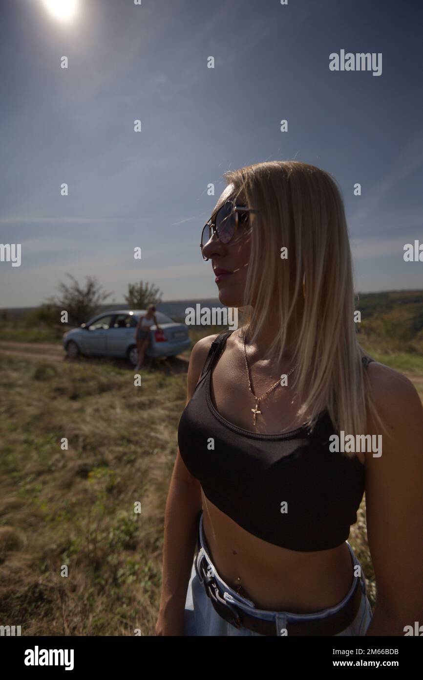 A beautiful girl is waiting for evening rest from work and bustle, serenity and freedom. Escape ...