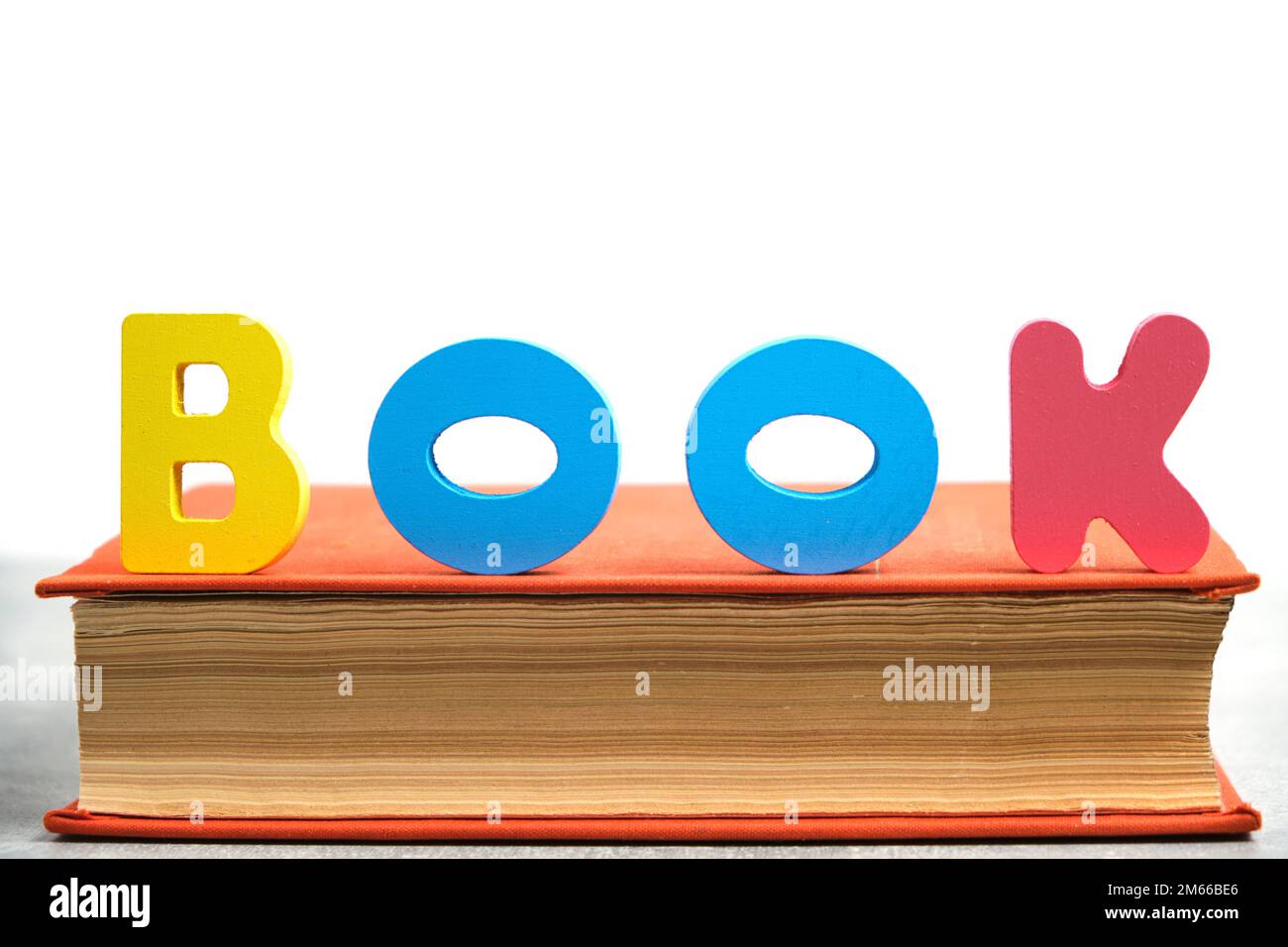 Multicolored letters English alphabet.Word book.Book white background ...