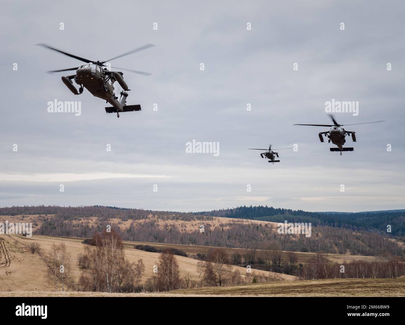 Three U.S. Army UH-60 Blackhawk helicopters from the 1-214th General ...