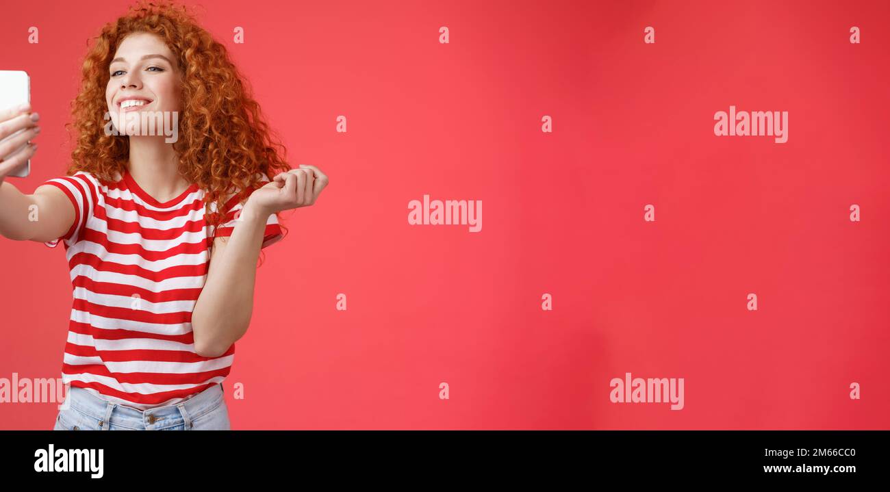 Cute pleased happy good-looking redhead ginger girl curly hairstyle ...