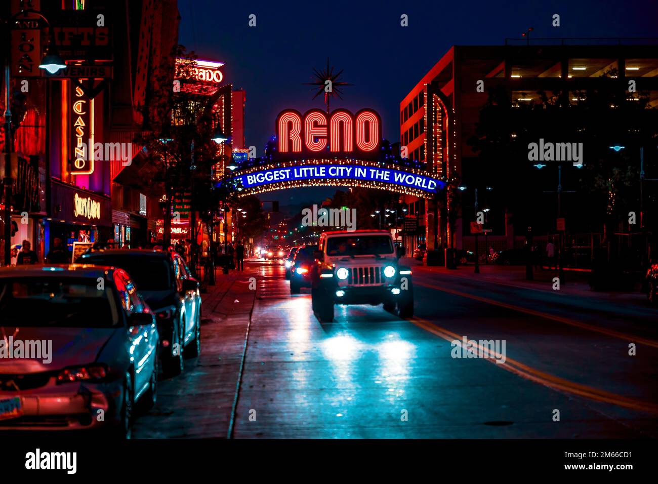 A beautiful view of cars in the street with neon lights in Downtown ...