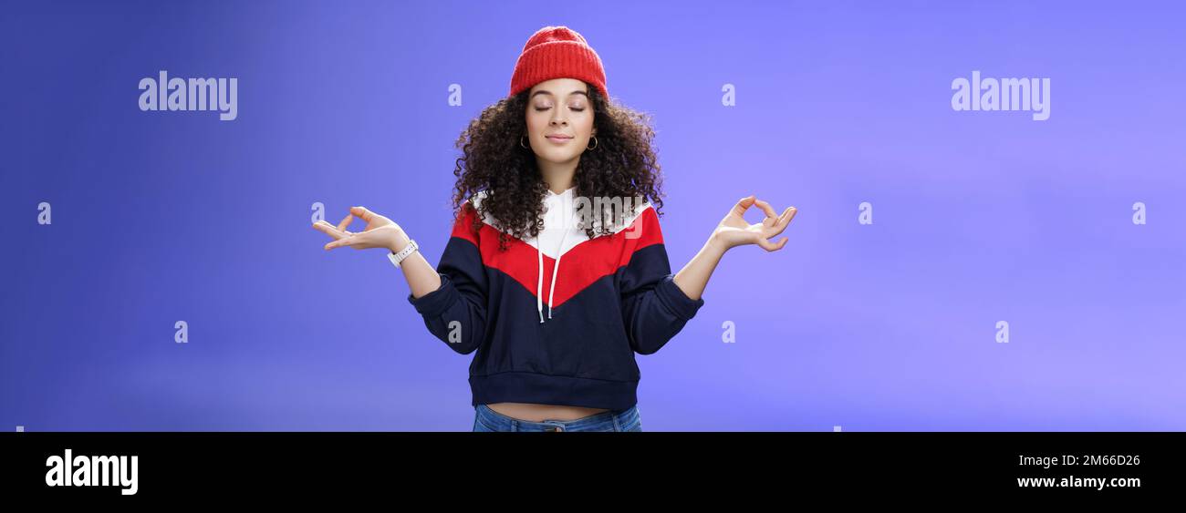 Waist-up shot of girl reaching nirvana feeling peaceful and calm ...