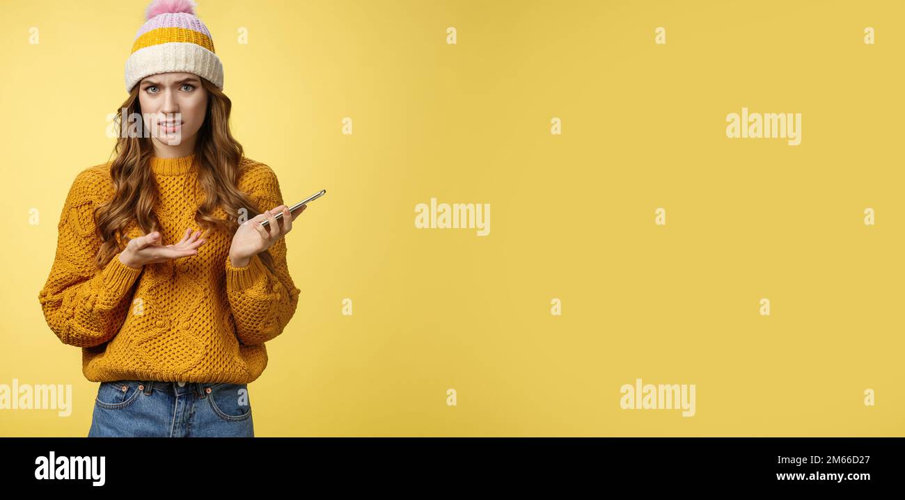 Confused cringing annoyed young woman shocked how friend talked her ...