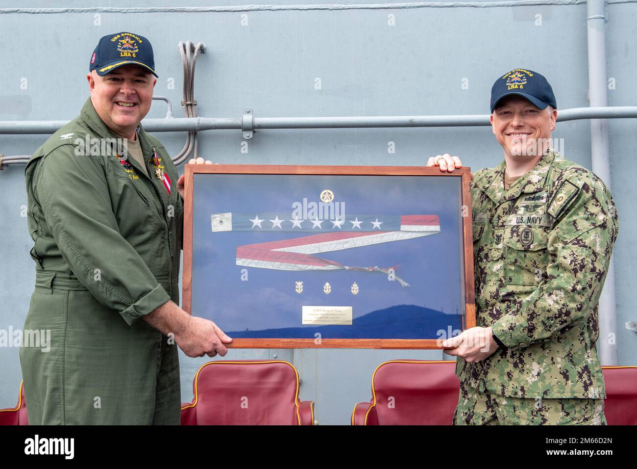 SASEBO, Japan (April 7, 2022) Capt. Ken Ward, left, sixth commanding ...