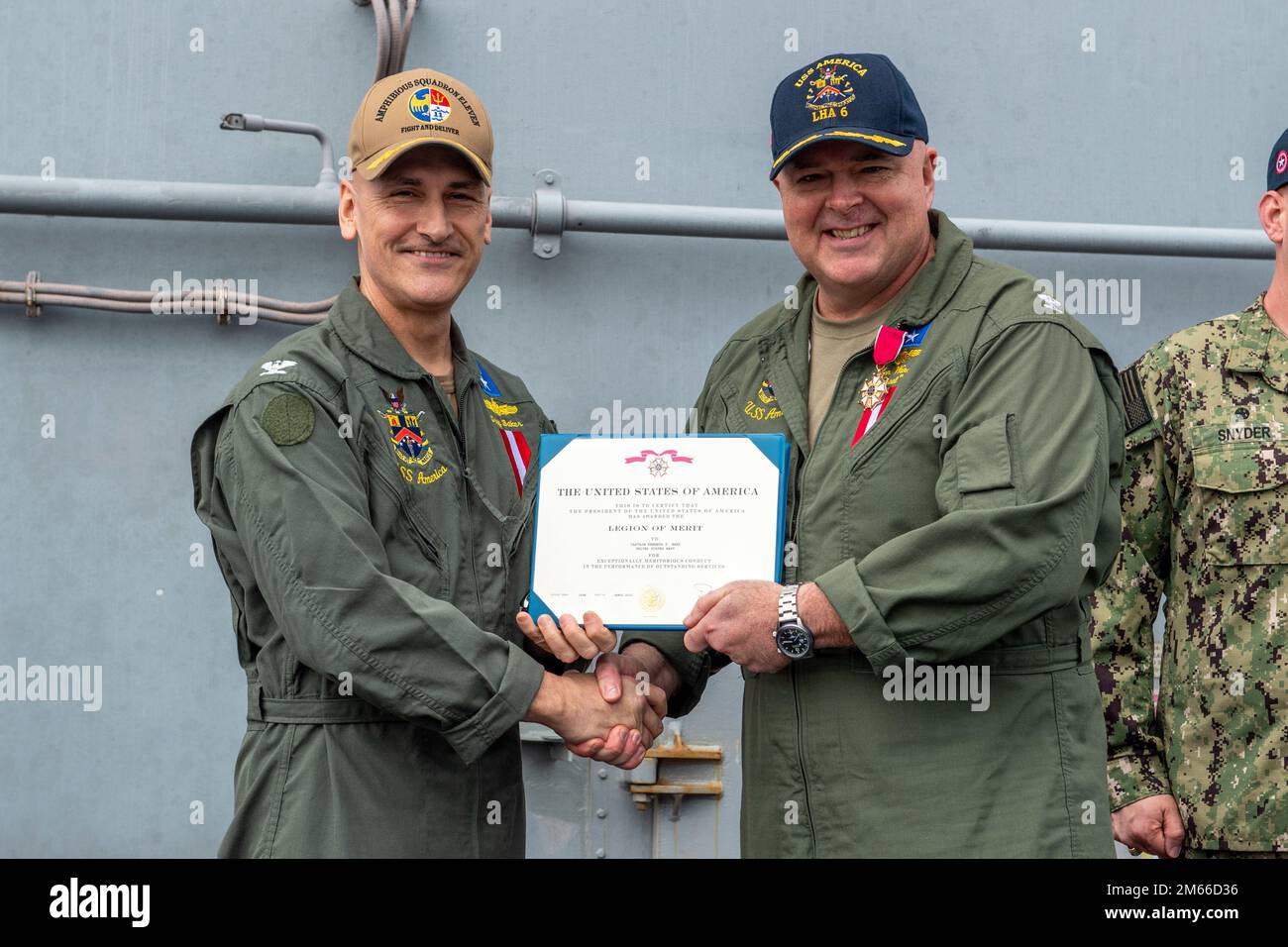 SASEBO, Japan (April 7, 2022) Capt. Ken Ward, right, sixth commanding ...