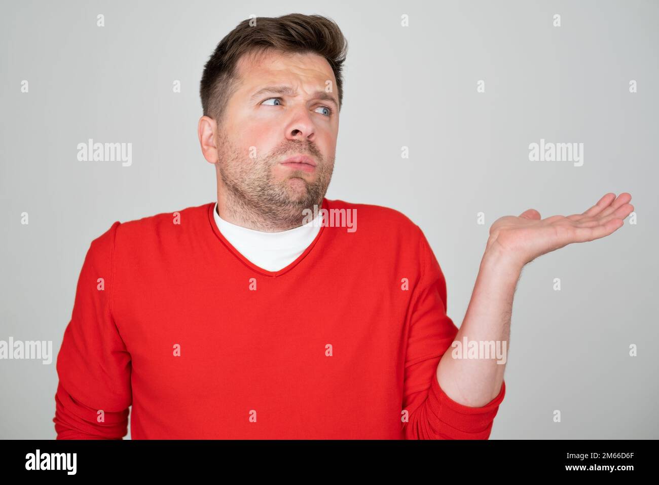 man clueless and confused expression with arms and hands raised Stock ...