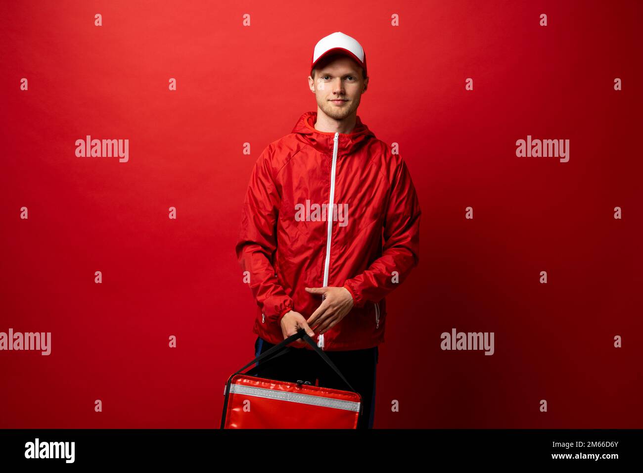 Delivery Service Concept. Portrait of confident smiling male courier ...