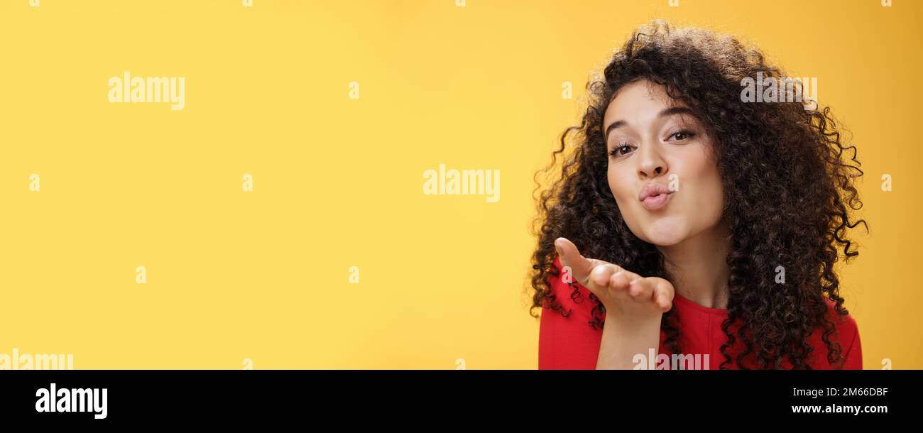 Sensual flirty and tender attractive girlfriend with curly hairstyle ...