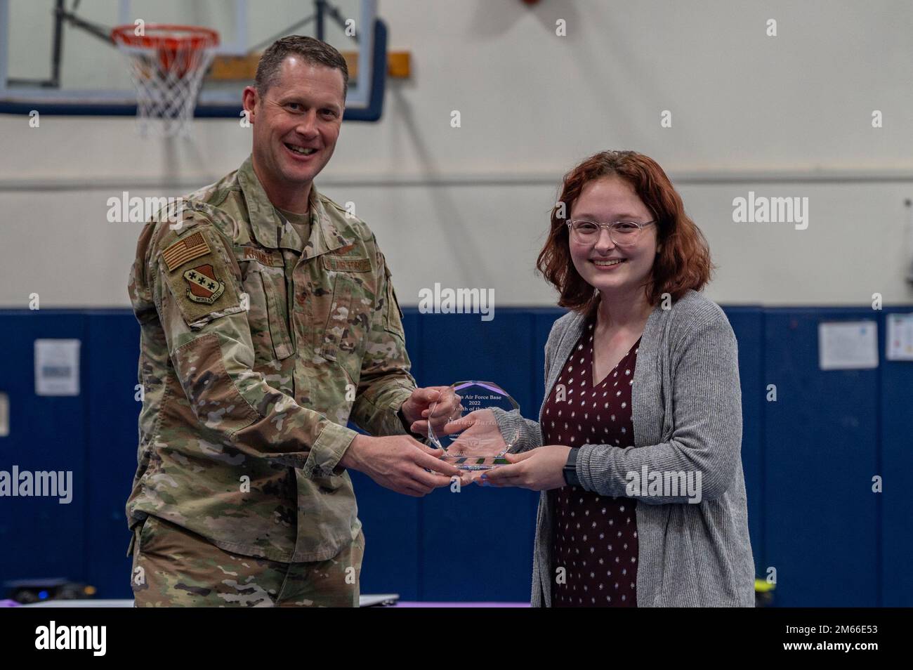 Col. Joseph Kramer, 7th Bomb Wing commander, poses with Hailey Barton ...