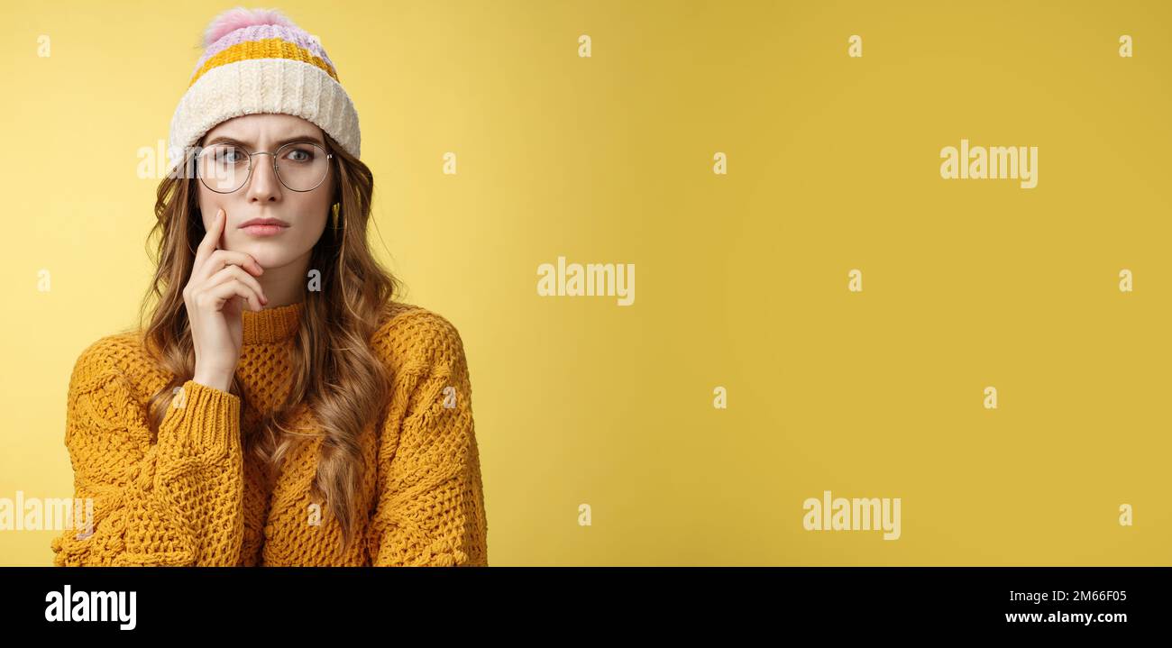 Serious-looking complicated attractive smart girl solving issue mind ...