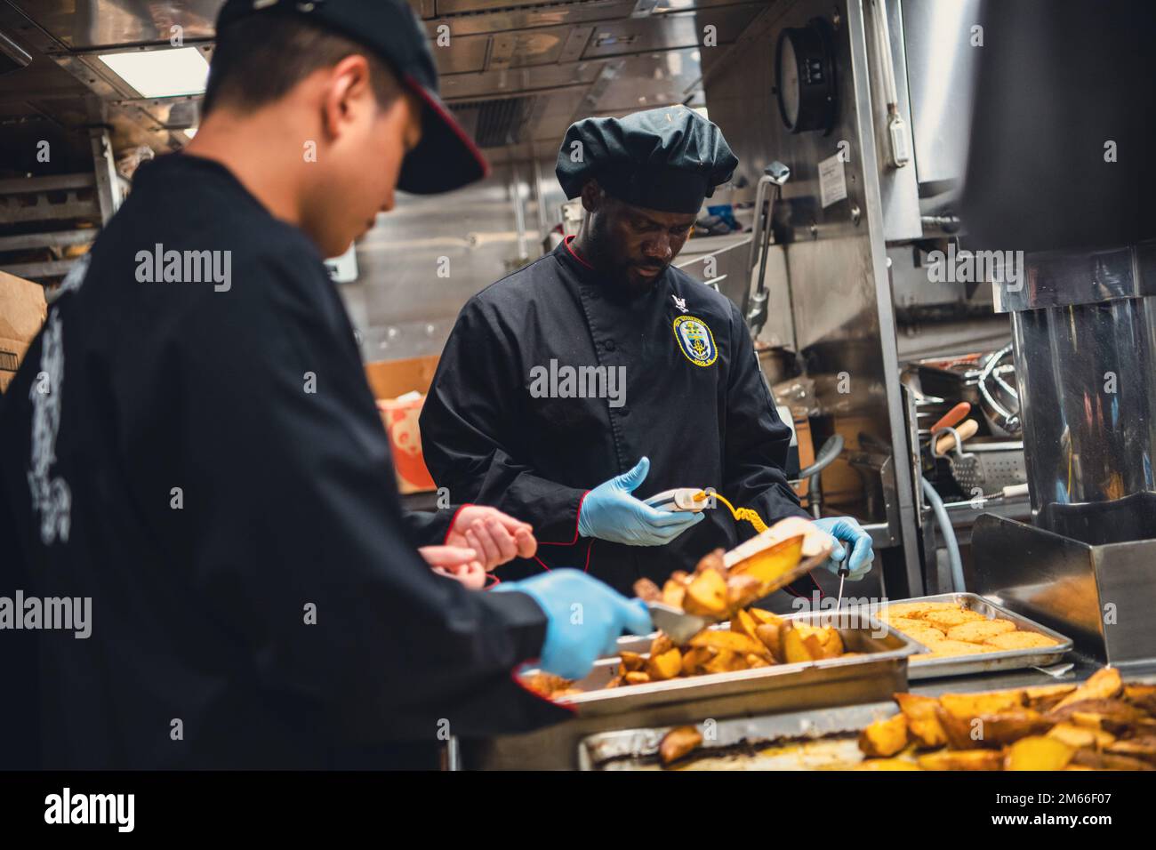 220407-N-TT059-2104 SOUTH CHINA SEA (Apr. 07, 2022) Culinary Specialist 3rd Class Kelvin Adjei ...