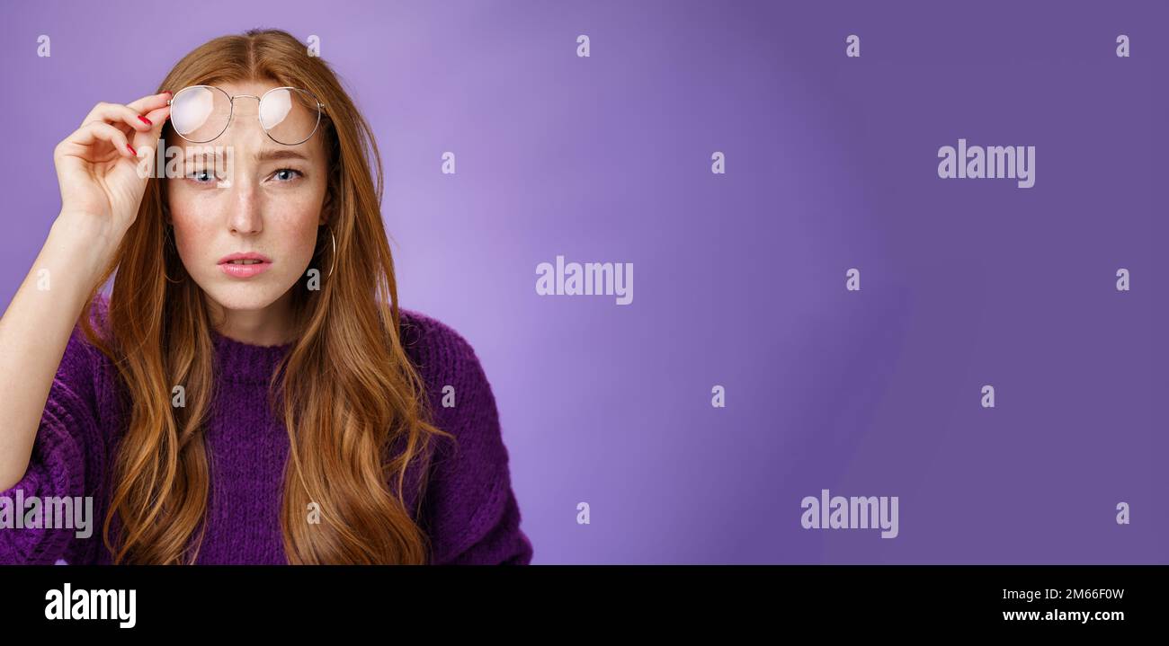 Waist-up shot of intense confused and unsure cute redhead female cannot ...