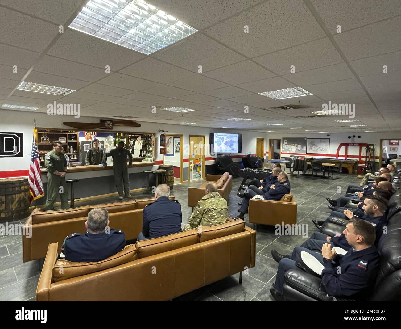 U.S. Airmen assigned to the 351st Air Refueling Squadron give Royal Air ...