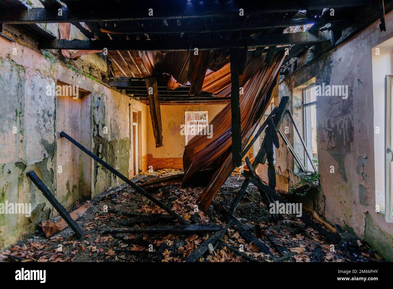 Burnt and ruined interior of office or apartment building. Consequences ...