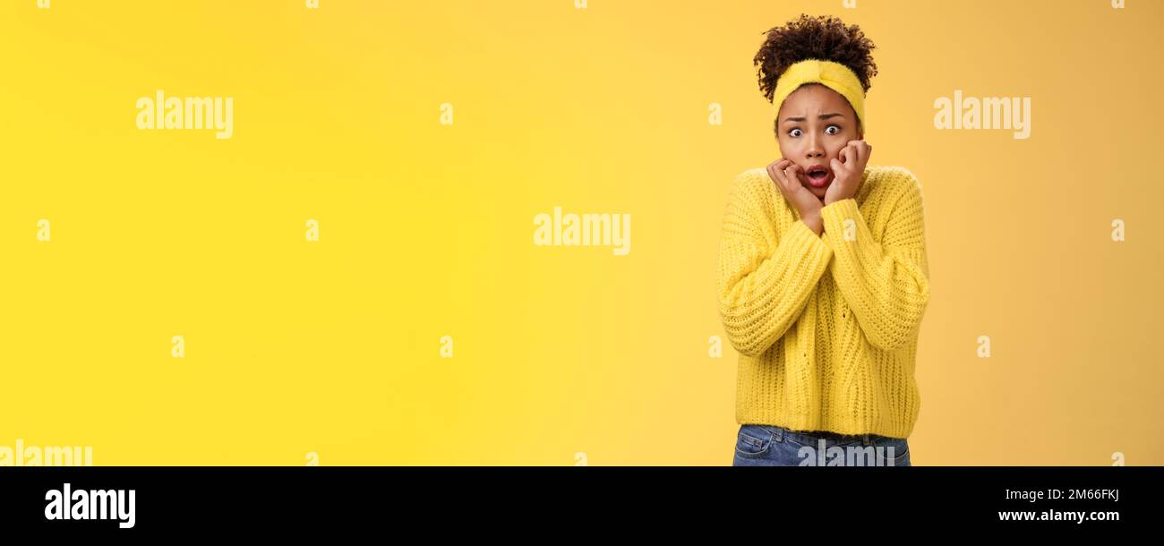 Scared stupefied trembling insecure timid african american woman afraid ...