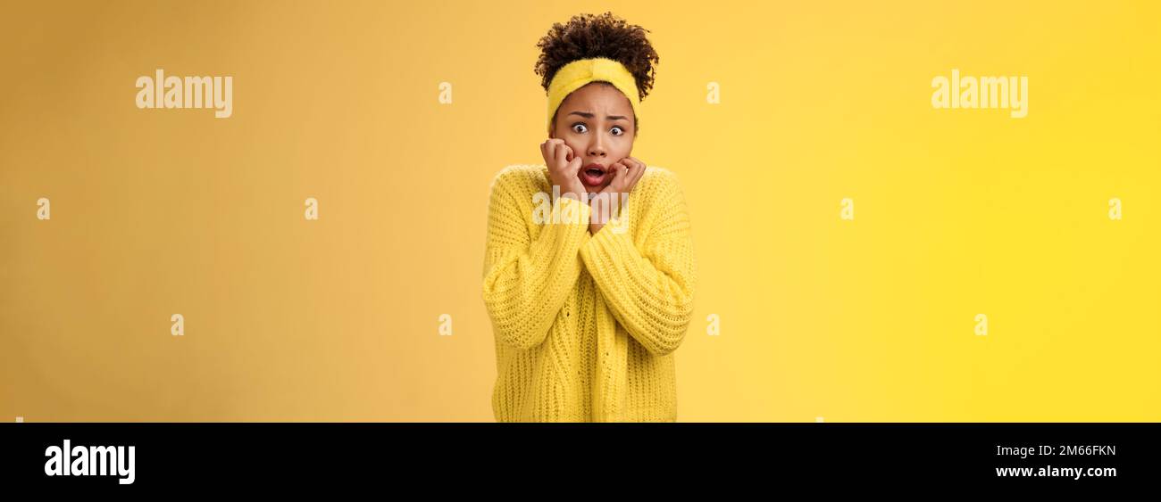 Scared stupefied trembling insecure timid african american woman afraid ...
