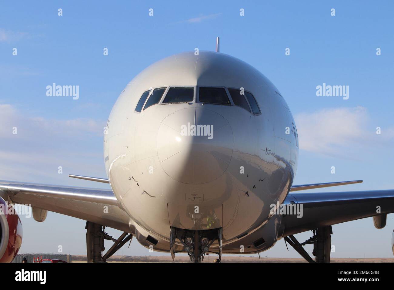 The 767 Omni Air International airplane taxies from the runway to the ...