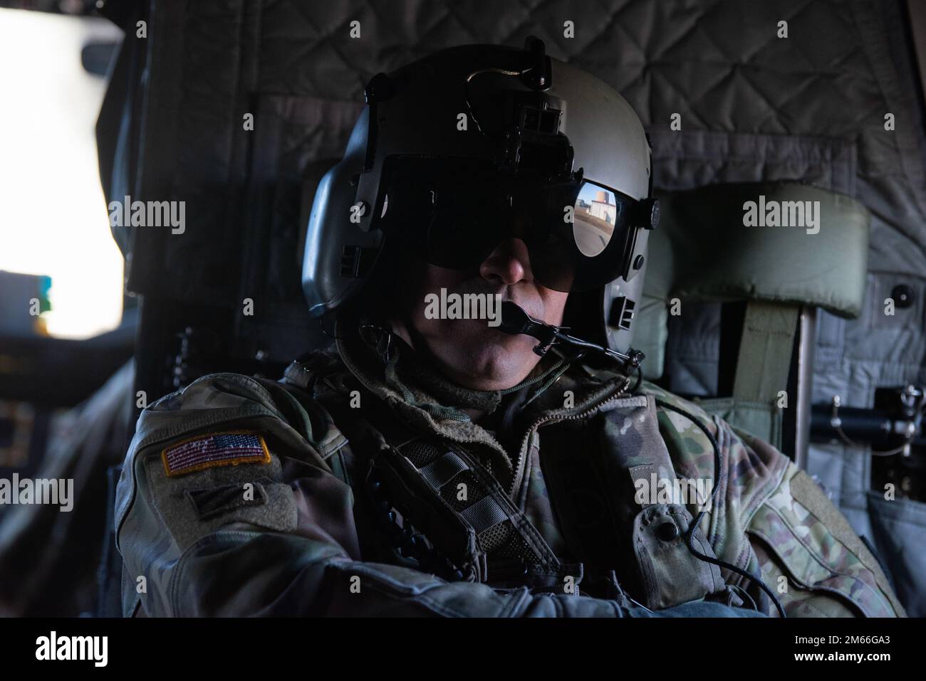 An Alaska Army National Guard CH-47 Chinook helicopter crew chief ...