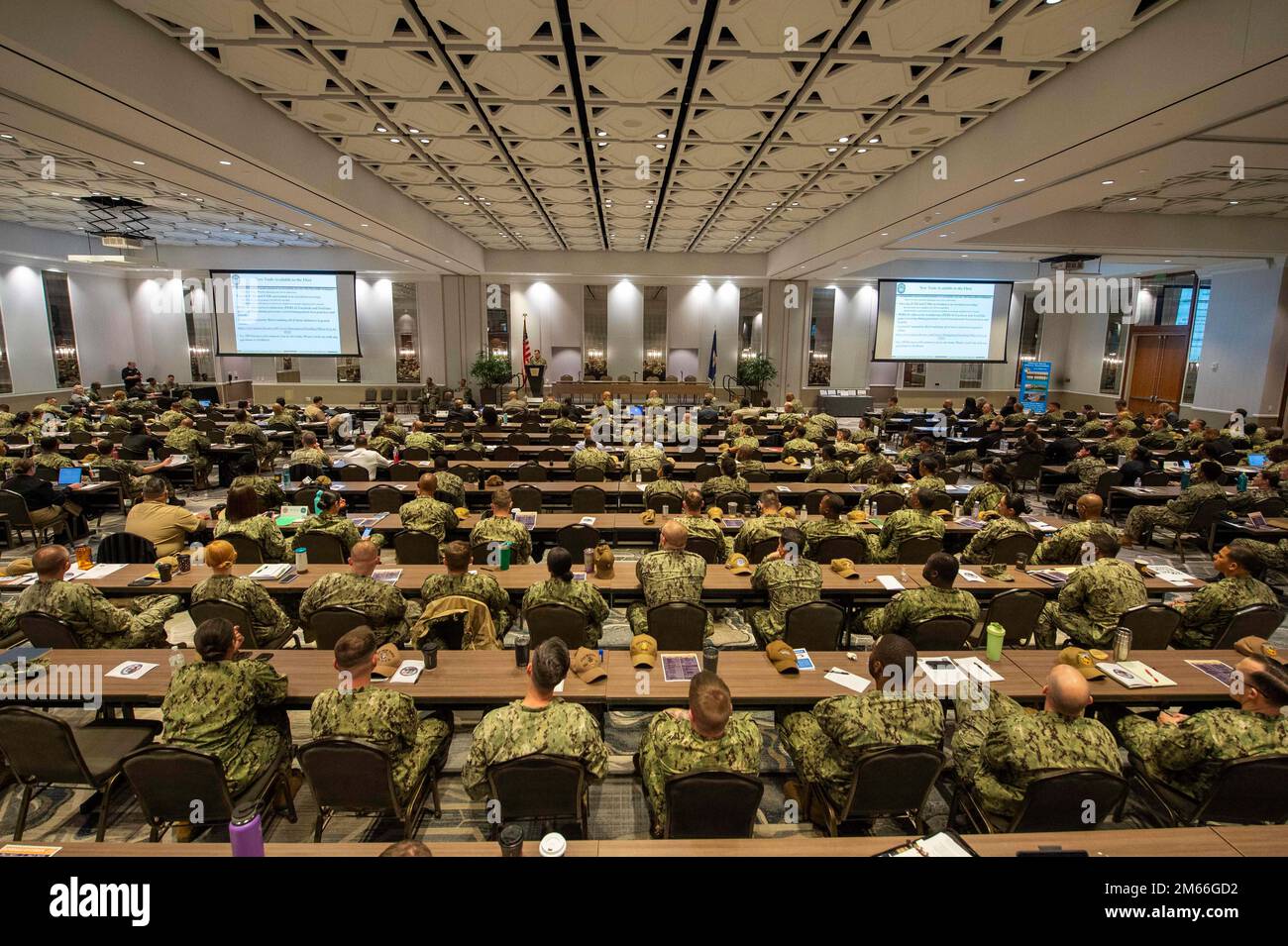 Sailors listen to a panel of speakers during the first-ever Naval ...