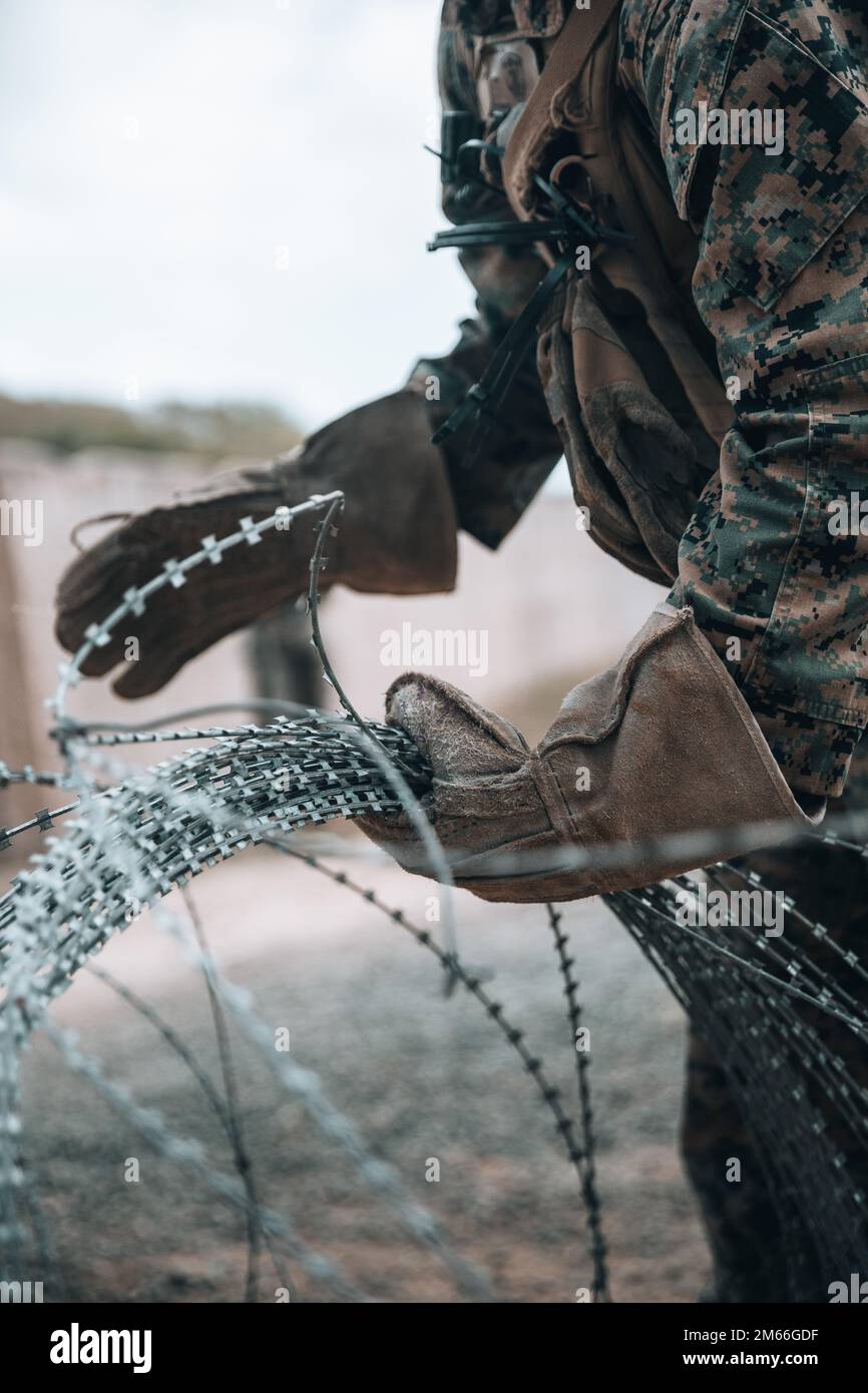 A U.S. Marine with 3d Battalion, 3d Marines establishes a controlled ...