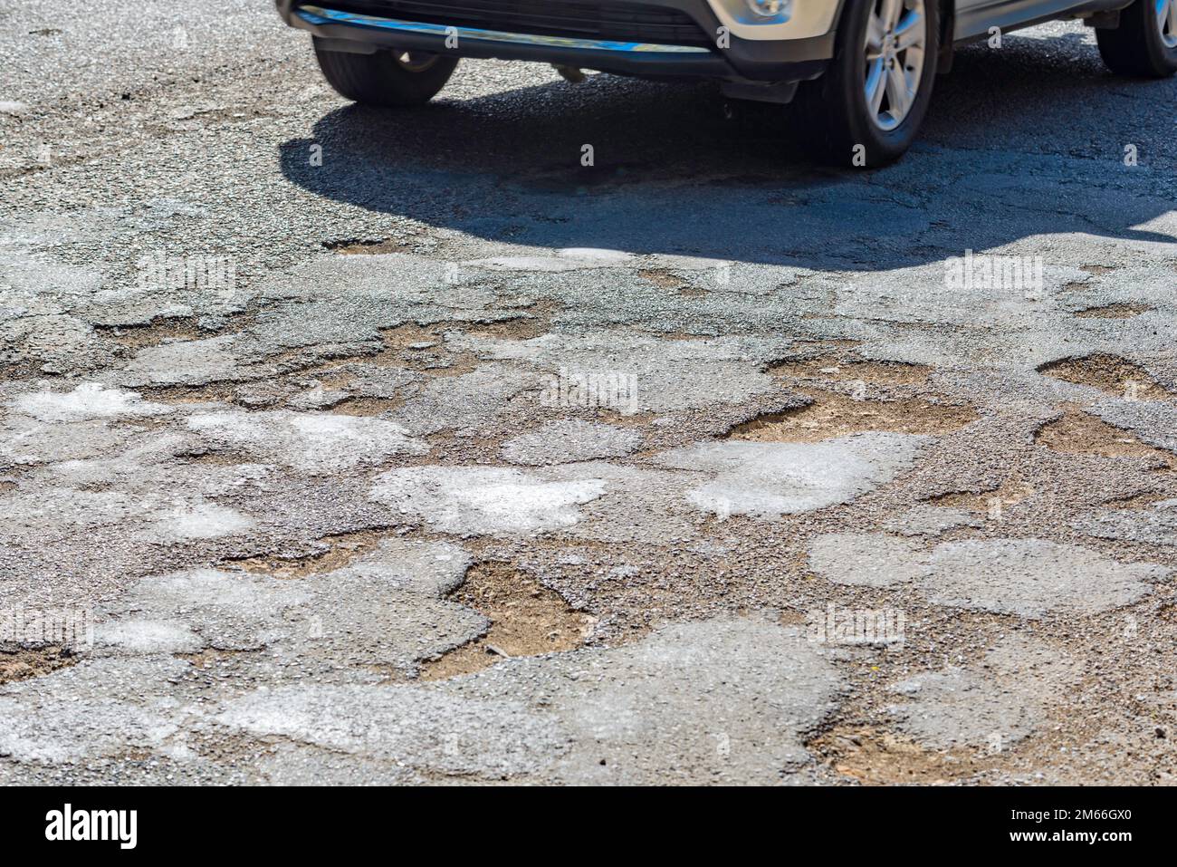 Road chuckholes hi-res stock photography and images - Alamy