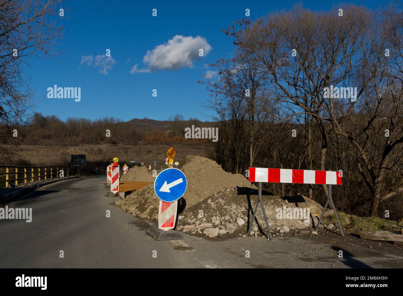 Interesting photo of road works on a small bridge. The image shows ...