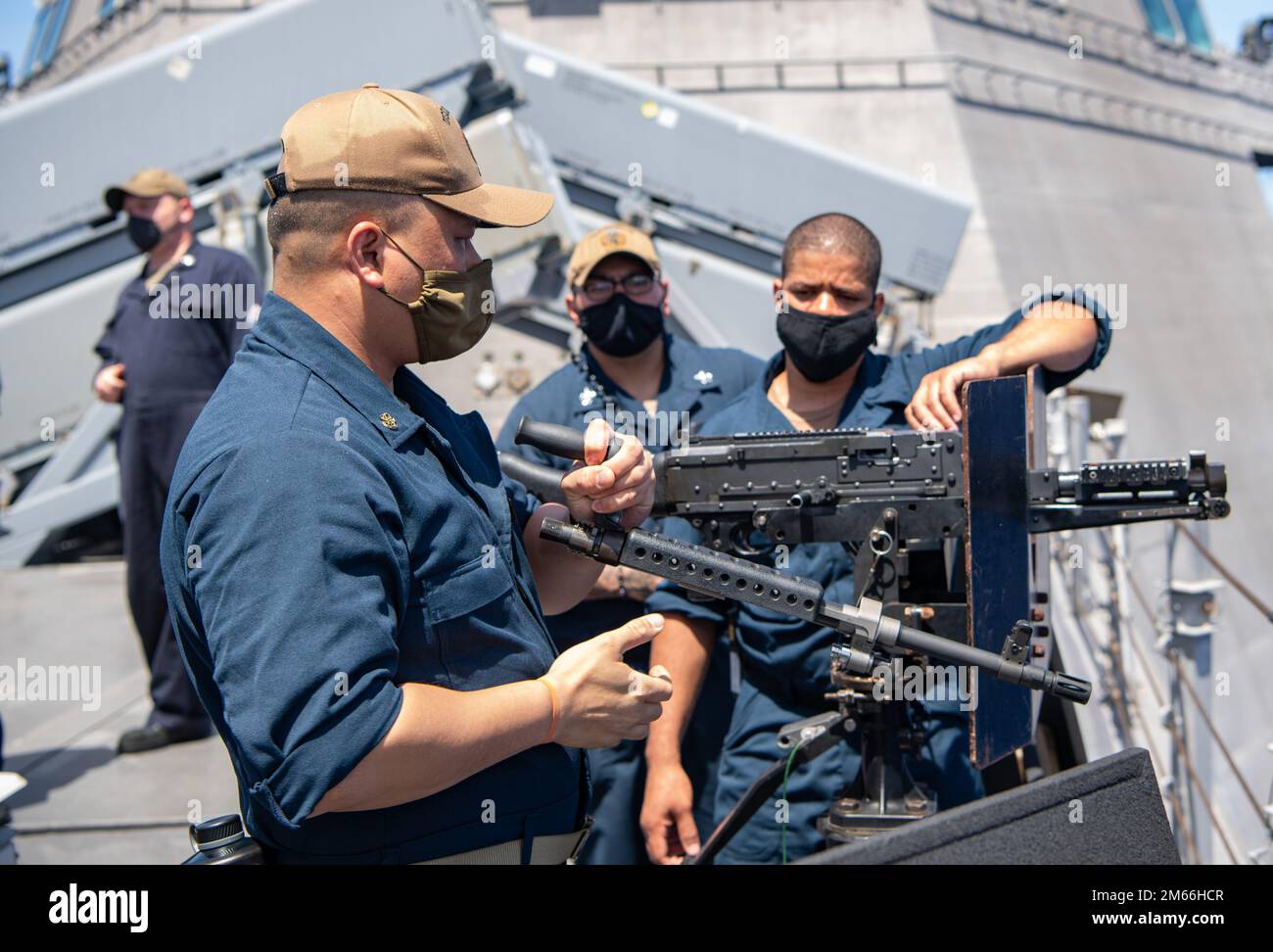 220407-N-JX182-1014 PHILIPPINE SEA (April 6, 2022) Sailors receive ...